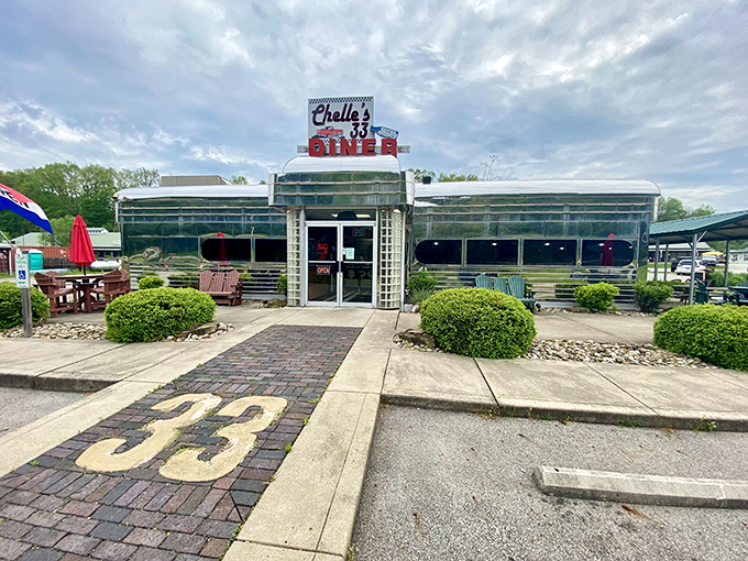 The gleaming stainless steel exterior of Chelle's 33 Diner stands like a time portal to the 1950s, complete with that iconic "33" beckoning hungry travelers.