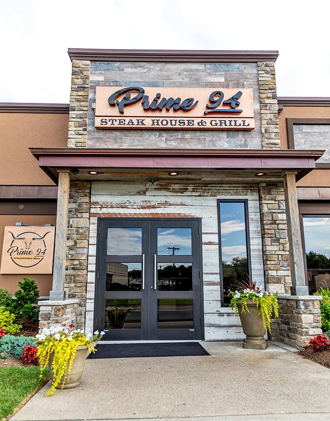 Stone facade, lush landscaping, and an American flag &ndash; Prime 94 announces itself with the confidence of a restaurant that knows exactly what it's doing.