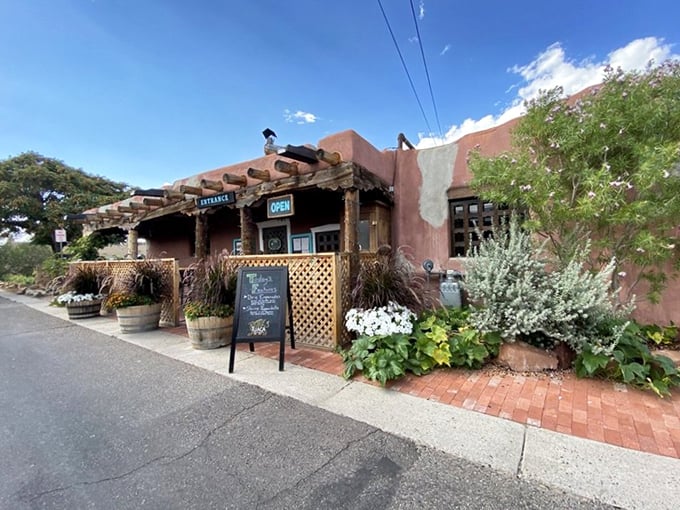 The iconic adobe façade of High Noon stands like a sentinel of Southwestern cuisine, complete with wooden vigas and that unmistakable New Mexican charm.