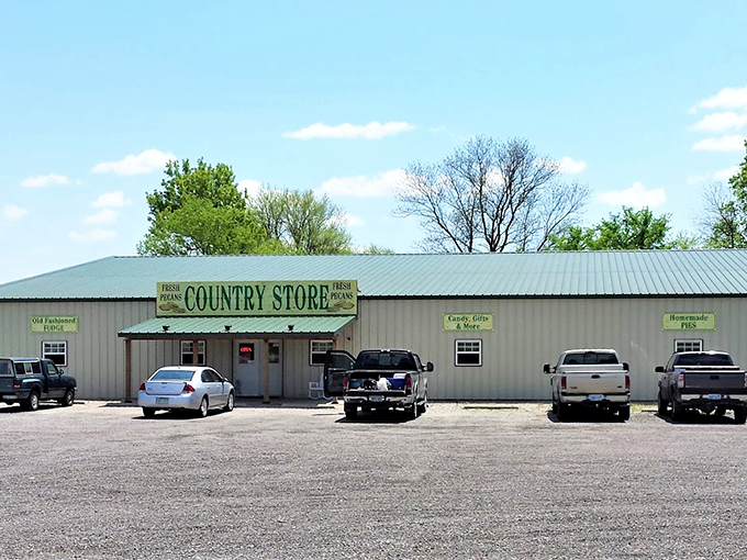 A slice of Americana greets you with that weathered wooden sign and American flag. The kind of place where "fresh pecans" isn't just advertising&mdash;it's a solemn promise.
