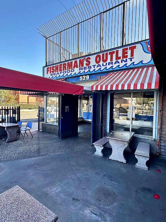 The red and white striped awning of Fisherman's Outlet stands like a beacon for seafood lovers in downtown LA's industrial district.