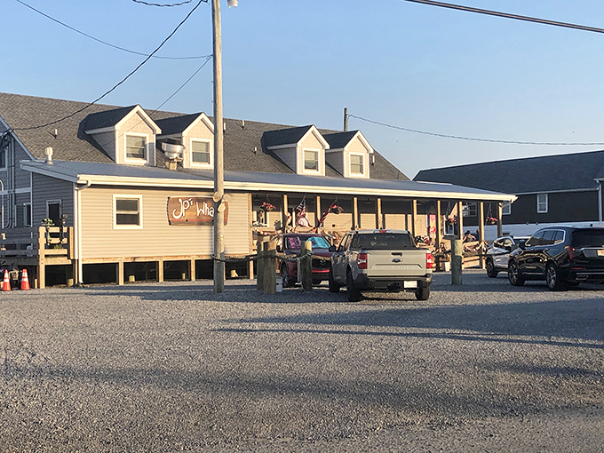 The quintessential coastal dining experience awaits on this weathered deck, where every table comes with a side of Delaware Bay breezes and waterfront tranquility.
