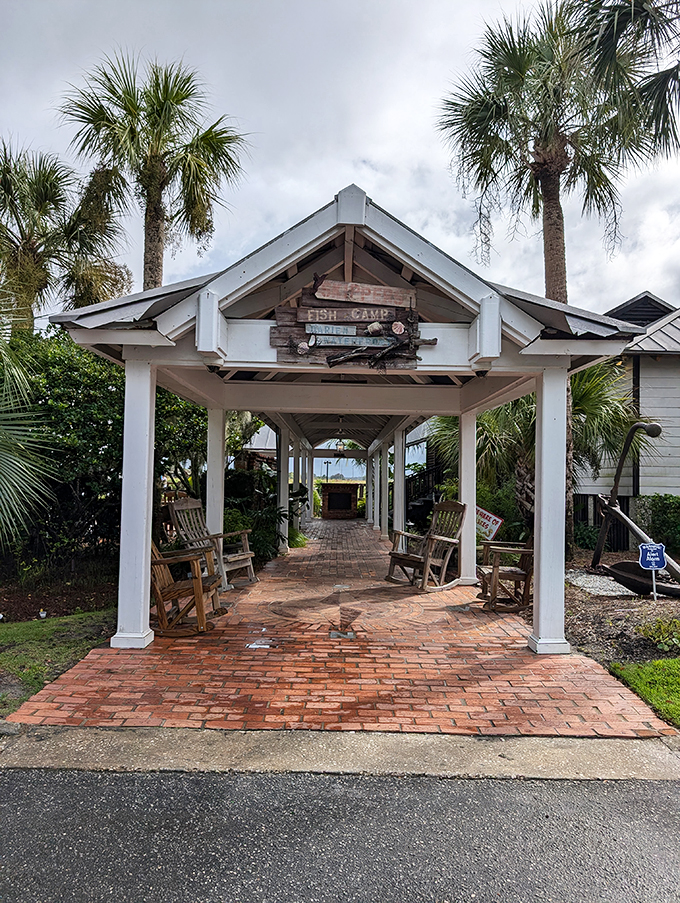 The wooden deck at Skipper's Fish Camp invites you to slow down and breathe in that coastal air. Those rocking chairs aren't just furniture&mdash;they're an invitation to linger.