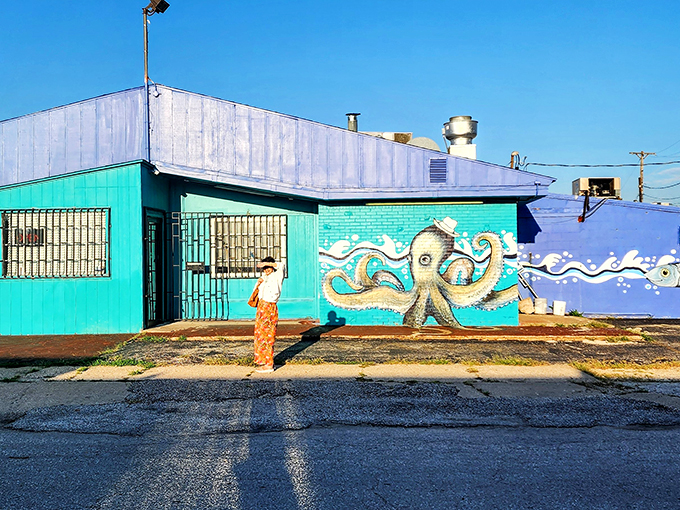 The turquoise building with its playful octopus mural stands like a colorful mirage in Kansas City, promising seafood treasures within.