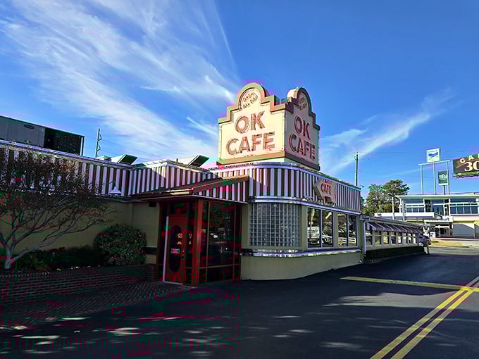 The iconic red and white awning of OK Cafe stands as a beacon of Southern comfort food in Atlanta's West Paces Ferry area.