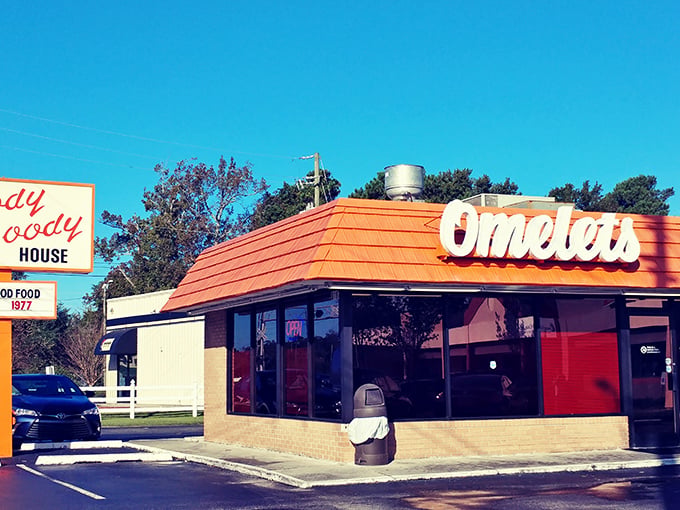 The iconic orange roof of Goody Goody Omelet House stands out like a breakfast lighthouse guiding hungry souls to their morning salvation.