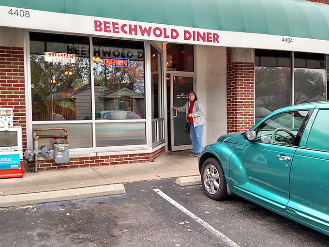 The blue awning of George's Beechwold Diner stands like a beacon of breakfast hope on Columbus's north side, promising comfort food salvation to all who enter.