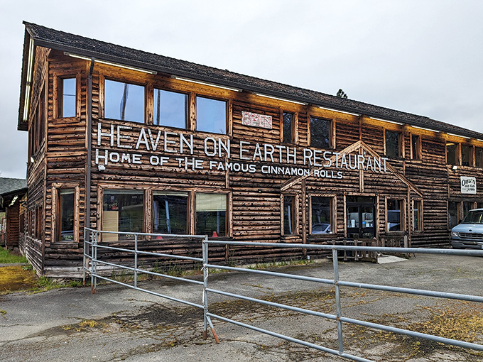 The rustic log cabin exterior of Heaven on Earth Restaurant stands as a beacon for hungry travelers on I-5, promising comfort food salvation in Azalea. 