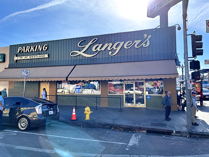 The iconic mint-green exterior of Langer's stands proudly at 7th and Alvarado, a beacon of pastrami perfection since 1947.