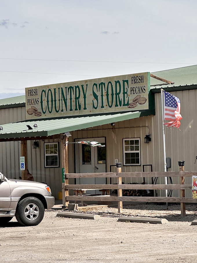A slice of Americana greets you with that weathered wooden sign and American flag. The kind of place where "fresh pecans" isn't just advertising&mdash;it's a solemn promise.