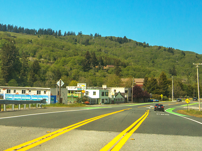The Redwood Gift Shop stands as a quirky gateway to natural wonders, where roadside charm meets forest magic.