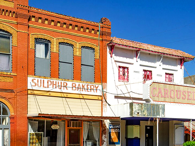 Downtown Sulphur's historic brick buildings transport you to a simpler time, where the Sulphur Bakery promises sweet treasures within its vintage storefront.