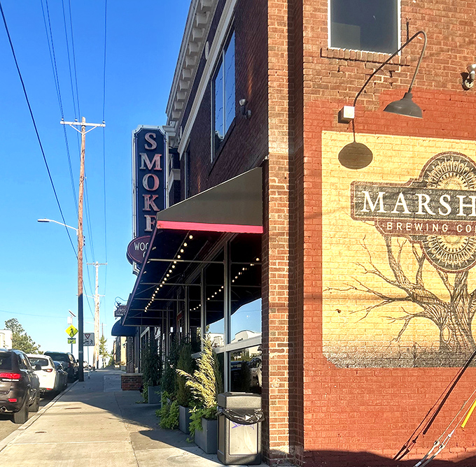 Brick and mortar never looked so inviting! SMOKE.'s exterior is like a siren call to hungry souls, with its vintage sign and cheery red door beckoning you inside.