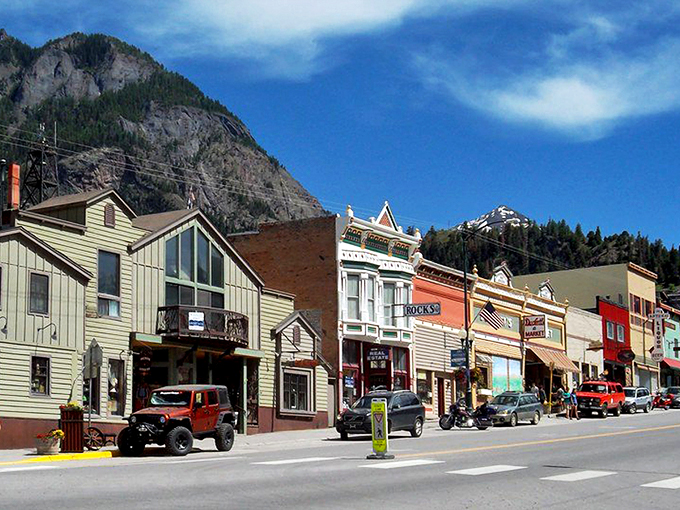 Ouray nestles perfectly in its mountain cradle like nature's version of a snow globe village &ndash; minus the artificial snow and plastic dome.