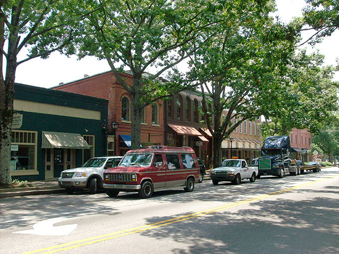 Downtown Madison's brick storefronts stand at attention like well-dressed Southern gentlemen, American flags fluttering in the Georgia breeze.