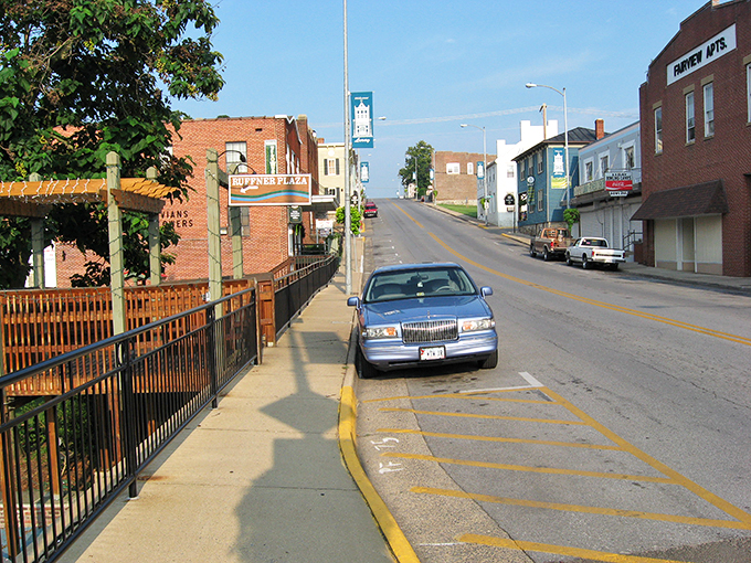 Main Street stretches before you like a Norman Rockwell painting come to life, brick buildings standing proud against the Blue Ridge backdrop.