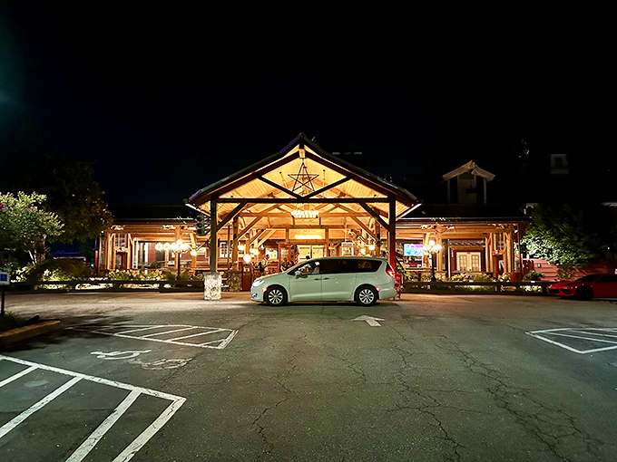 The grand entrance of Angus Barn stands like a rustic cathedral dedicated to the worship of perfectly cooked beef. Welcome to meat heaven.