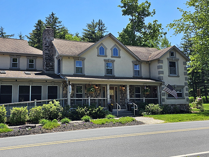 The Frogtown Chophouse stands proudly against the Pocono sky, its inviting porch practically whispering, "Come in, hungry traveler, prime rib awaits."