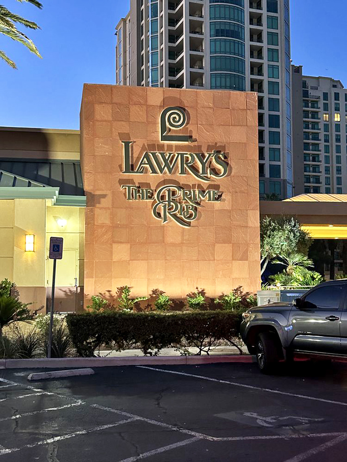 The iconic terracotta facade of Lawry's stands proudly against the Vegas sky, promising carnivorous delights within&mdash;a meaty oasis amid the neon desert.