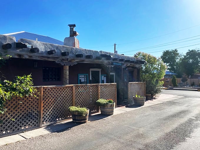 The iconic adobe façade of High Noon stands like a sentinel of Southwestern cuisine, complete with wooden vigas and that unmistakable New Mexican charm.