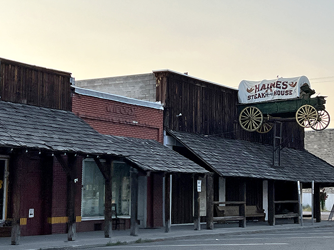 The iconic stagecoach sign perched atop Haines Steak House announces your arrival to beef paradise, standing proudly against the Eastern Oregon sky.