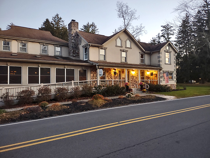 The Frogtown Chophouse stands proudly against the Pocono sky, its inviting porch practically whispering, "Come in, hungry traveler, prime rib awaits."