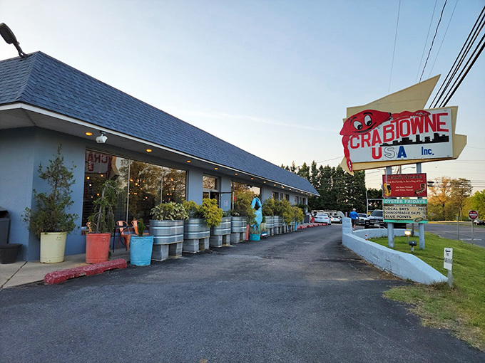 That iconic retro sign says it all: at Crabtowne USA, you're entering a delightful time warp where seafood and nostalgia reign supreme.