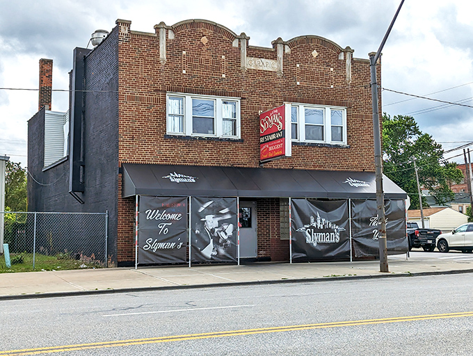 The brick facade of Slyman's proudly announces its mission with that iconic red sign: "Home of the Biggest Corned Beef Sandwiches." Consider yourself warned&mdash;and enticed.