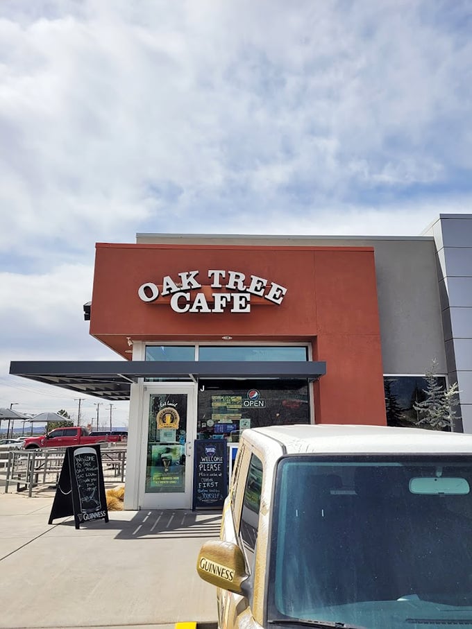 The bright red exterior of Oak Tree Cafe stands out like a beacon for sandwich seekers, promising delicious refuge from Albuquerque's desert heat.