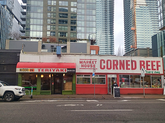 Like a culinary time capsule among Seattle's glass towers, this red-and-white storefront has been proudly declaring its corned beef allegiance since 1948. Photo Credit: Jonathan Dupuy