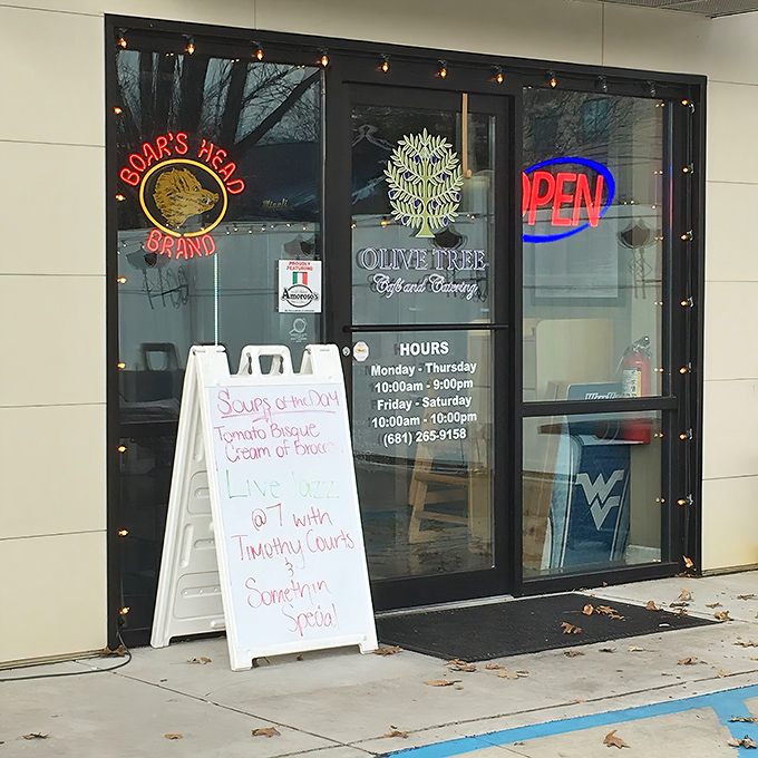 The unassuming exterior of Olive Tree Cafe hides culinary treasures within, like finding a diamond in your backyard. That neon "OPEN" sign is your invitation to flavor paradise.