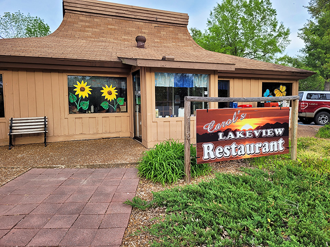 A rainbow arches over Carol's Lakeview Restaurant, as if nature itself is pointing the way to this unassuming culinary treasure in Cherokee Village.