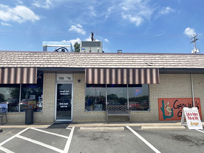 The unassuming exterior of Gadwall's Grill proves once again that the best food often hides behind the most modest facades. Those striped awnings have sheltered hungry Arkansans for generations.