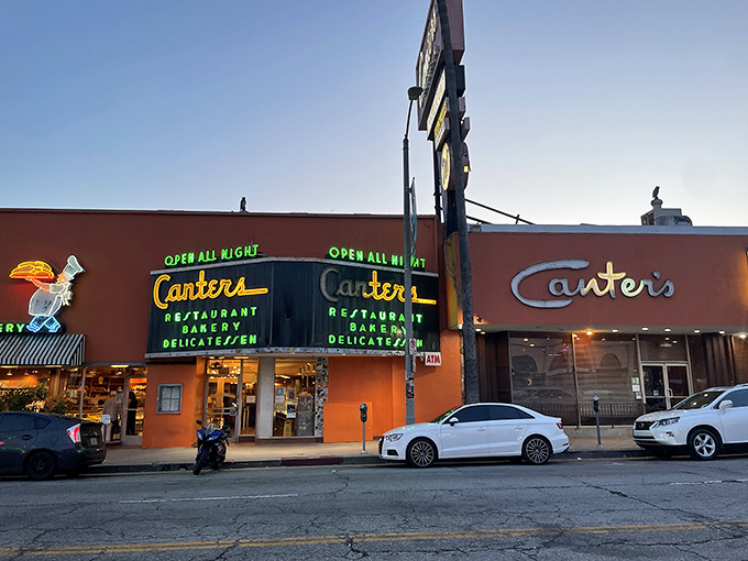 The neon-lit promise of "OPEN ALL NIGHT" isn't just signage&mdash;it's a beacon of hope for the hungry at 3 AM when good decisions are optional but great sandwiches are mandatory.