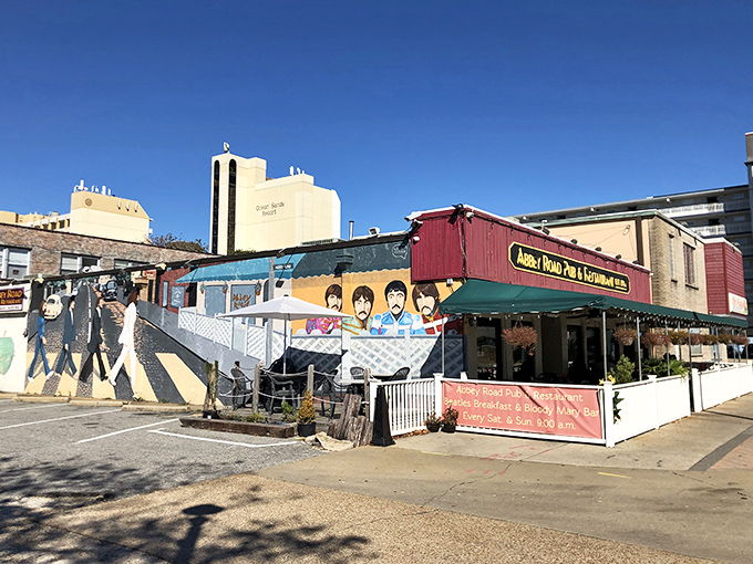 The Beatles would be proud! Abbey Road Pub's colorful exterior mural announces its musical inspiration while promising British comfort food with an oceanside twist.