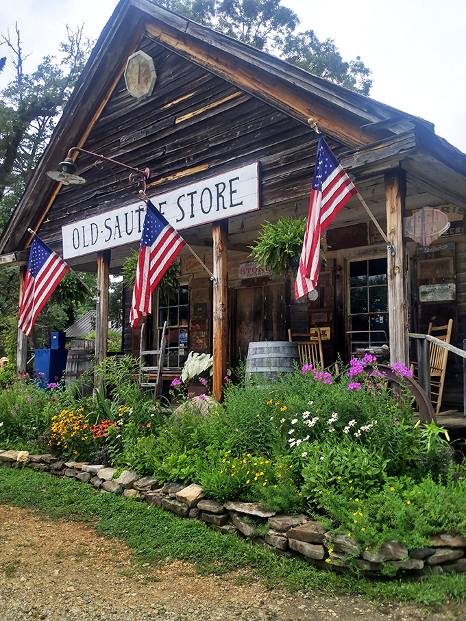 The Old Sautee Store stands like a time capsule with American flags proudly waving, as if to say "Slow down, city slicker, good food takes time."