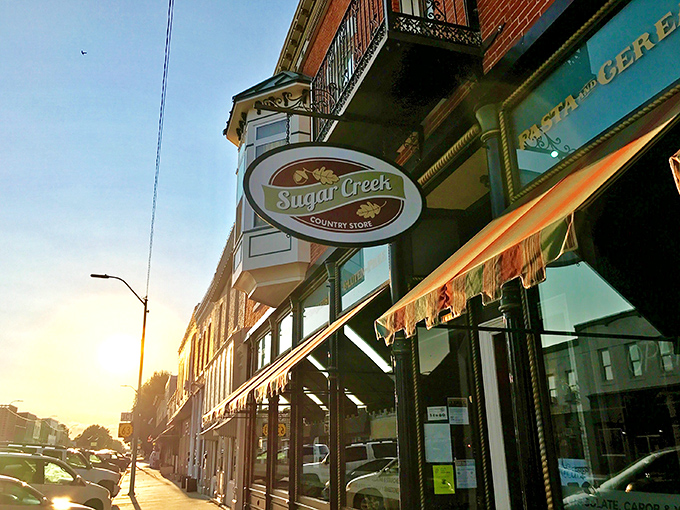 The historic brick fa&ccedil;ade of Sugar Creek Country Store beckons like an old friend, promising delicious treasures behind that charming wooden door.