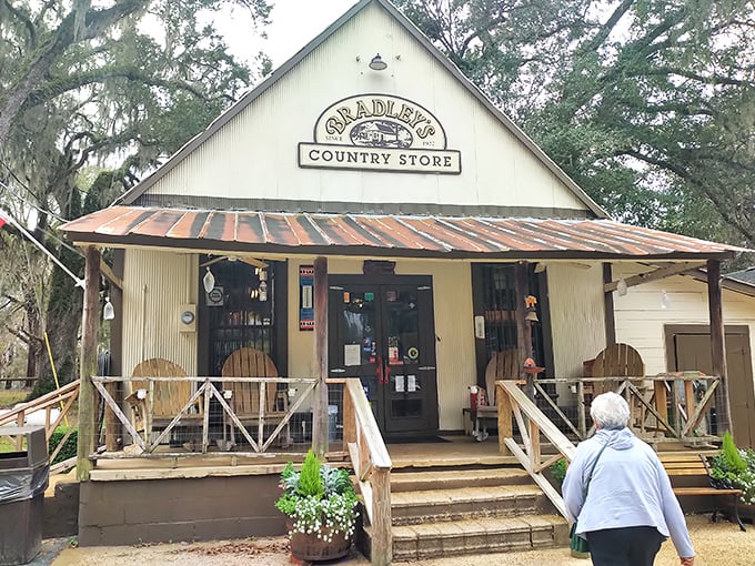 The white clapboard facade of Bradley's Country Store stands like a time capsule among the Spanish moss, beckoning hungry travelers with promises of smoky delights.