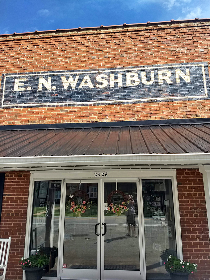 The iconic brick fa&ccedil;ade of E.N. Washburn's has stood sentinel since 1831, a time capsule of Americana waiting behind those welcoming doors. 