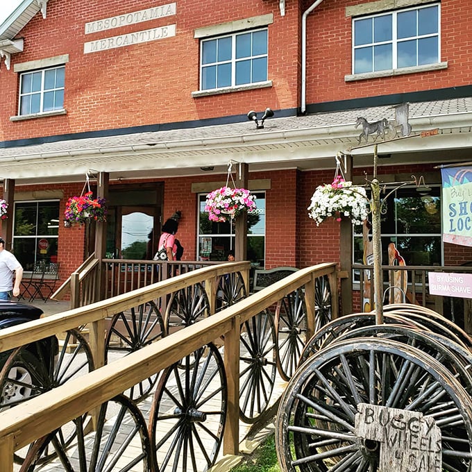 The white-columned porch and patriotic bunting aren't just for show&mdash;they're your first clue that authentic Americana awaits inside this red brick treasure.