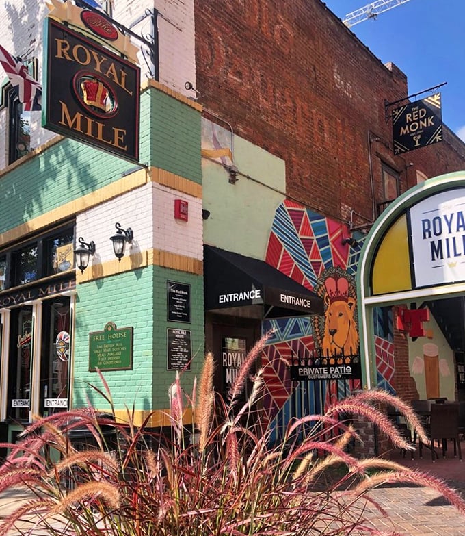 The mint-green facade of The Royal Mile stands out in downtown Des Moines like a British flag at an Iowa corn festival.