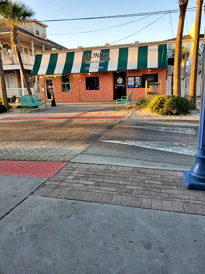 The unmistakable green fa&ccedil;ade of Bernie's with its jaunty striped awning&mdash;like a seafood speakeasy hiding in plain sight on Tybee Island.