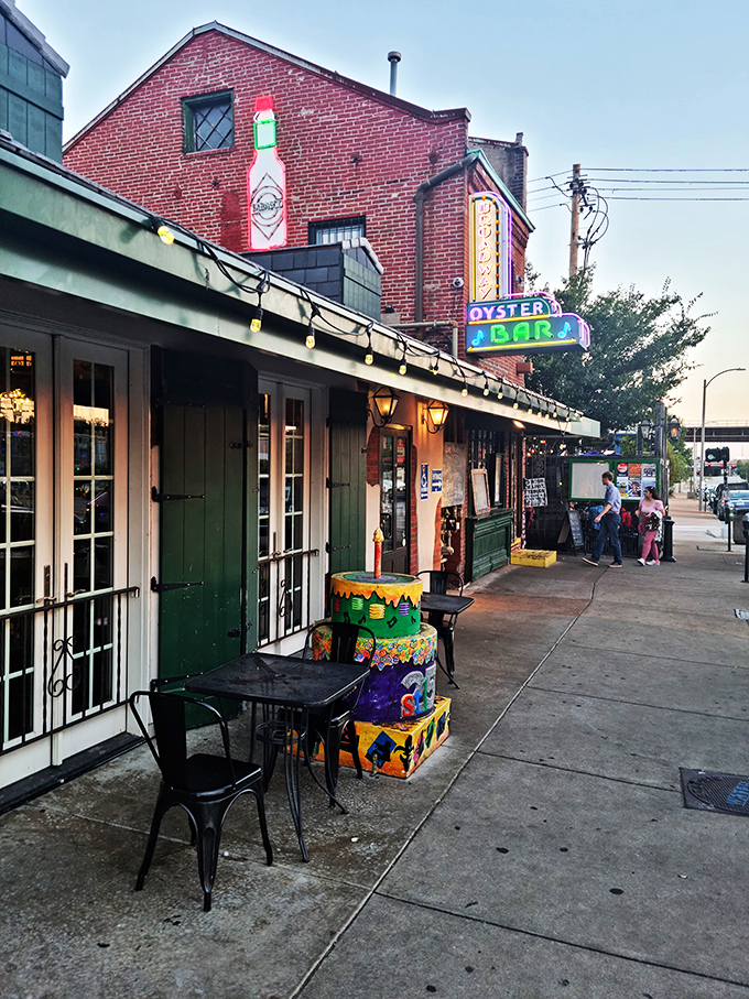 The neon dreams of New Orleans come alive at Broadway Oyster Bar, where this historic brick building has been serving up Cajun magic since 1978. 