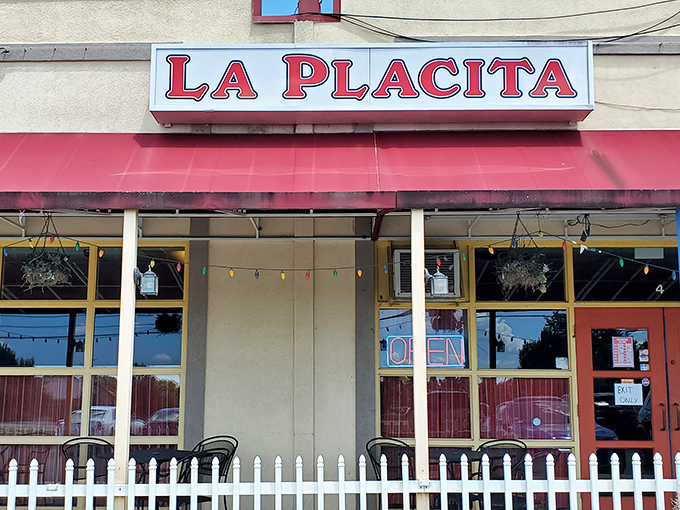 The vibrant green and yellow walls aren't just decoration—they're a preview of the colorful flavor fiesta about to happen on your plate.