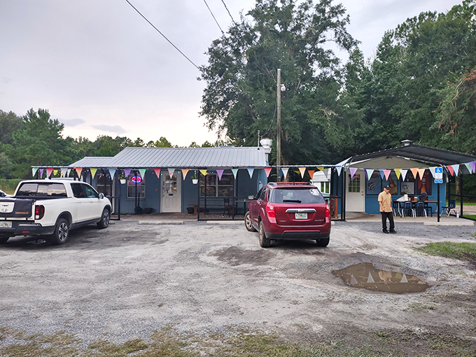 The little blue building that could! Taqueria El Sabor's humble exterior with twinkling lights might not scream "culinary destination," but locals know better.