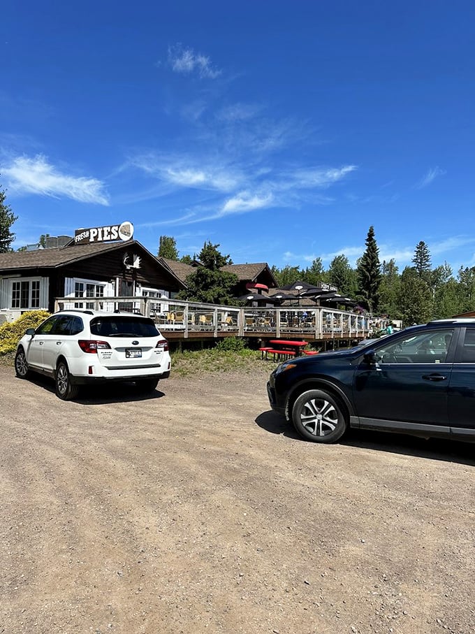 The North Shore's wooden welcome mat beckons with rustic charm. Those timber beams and welcoming porch promise comfort before you even reach the door.