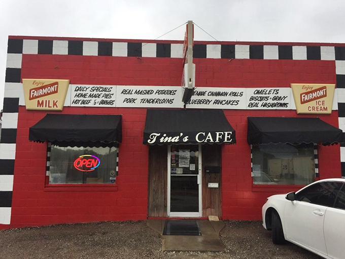The checkered racing theme begins before you even walk in. This vibrant red building promises comfort food that'll have you waving the checkered flag of satisfaction.