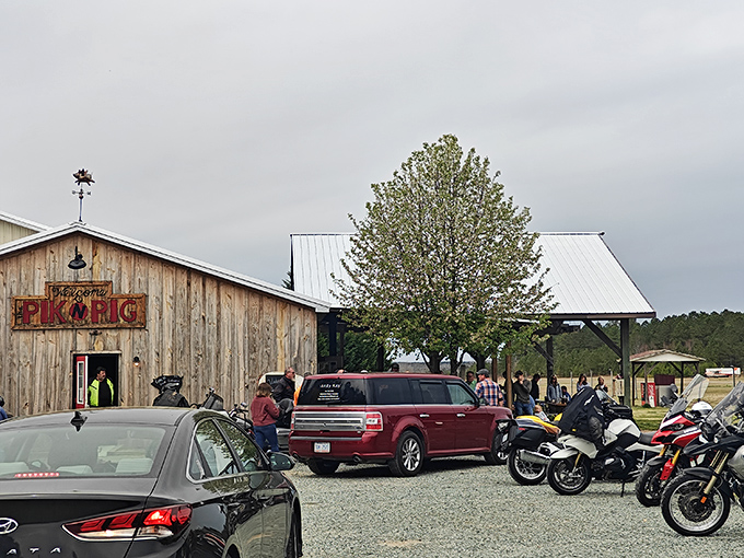 The rustic wooden exterior with that bright red door is like a beacon for barbecue pilgrims. Simplicity never looked so appetizing.