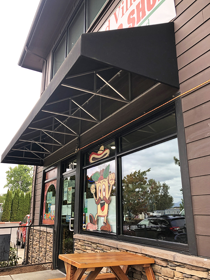 The unassuming exterior of Wood Village Burrito Shop might not scream "culinary destination," but like any great treasure, the real magic happens once you step inside.