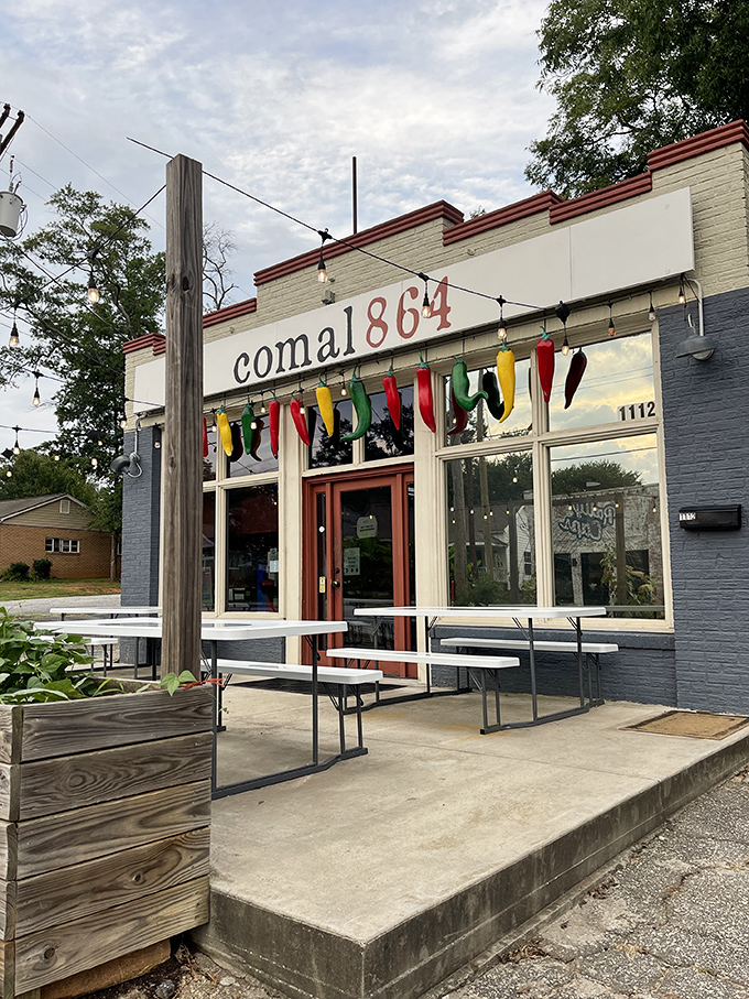 The colorful chili pepper garland hanging above Comal 864's entrance isn't just decoration&mdash;it's a preview of the flavor fiesta waiting inside.